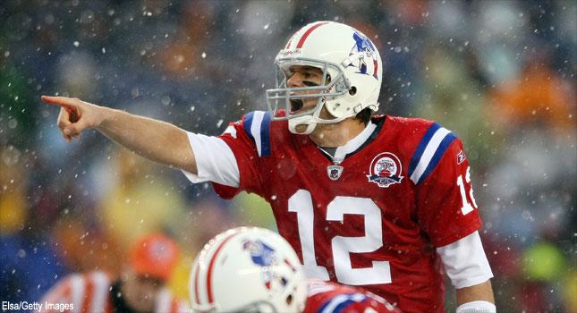 Snow can’t stop Brady from setting TD mark