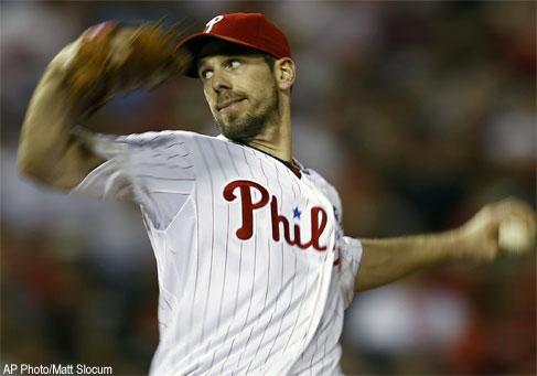 Lee dominates his former team in Phillies win