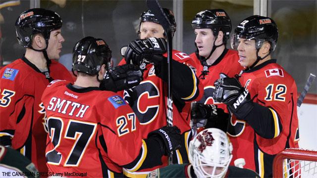 Flames hang on for win over Red Wings