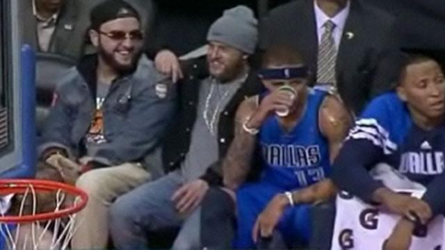 Watch: Two fans get comfy on Mavs’ bench