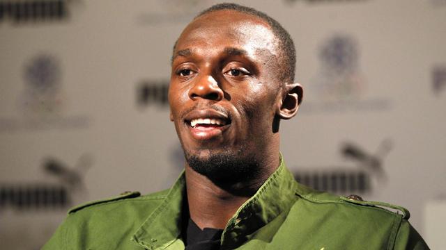 Bolt in minor car crash, but not injured