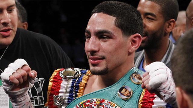 Garcia stops Morales in 4th to retain belt