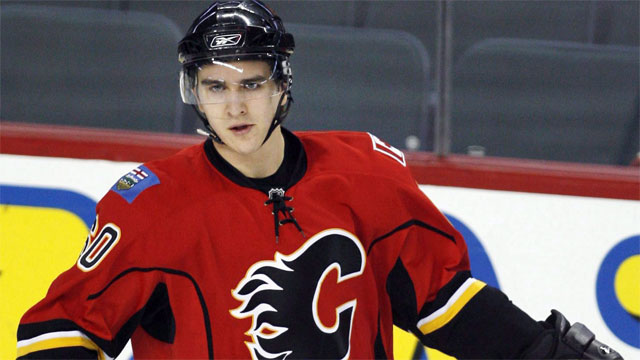 Flames’ Backlund leaves rink on crutches