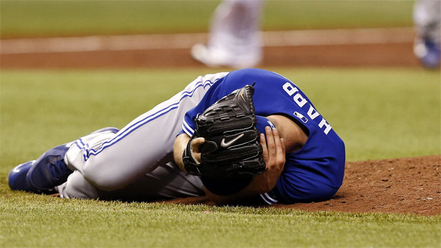 Blue Jays’ Happ takes ball off head, carted off