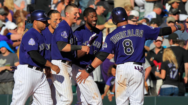 Fowler’s RBI single in 10th lifts Colorado over LA