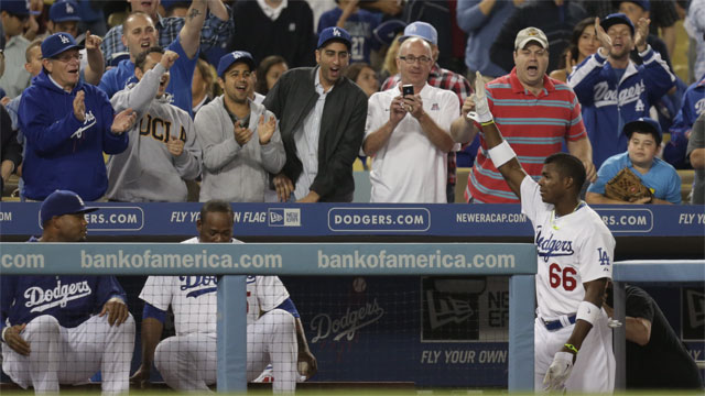 Rookie Puig makes Dodgers history in victory