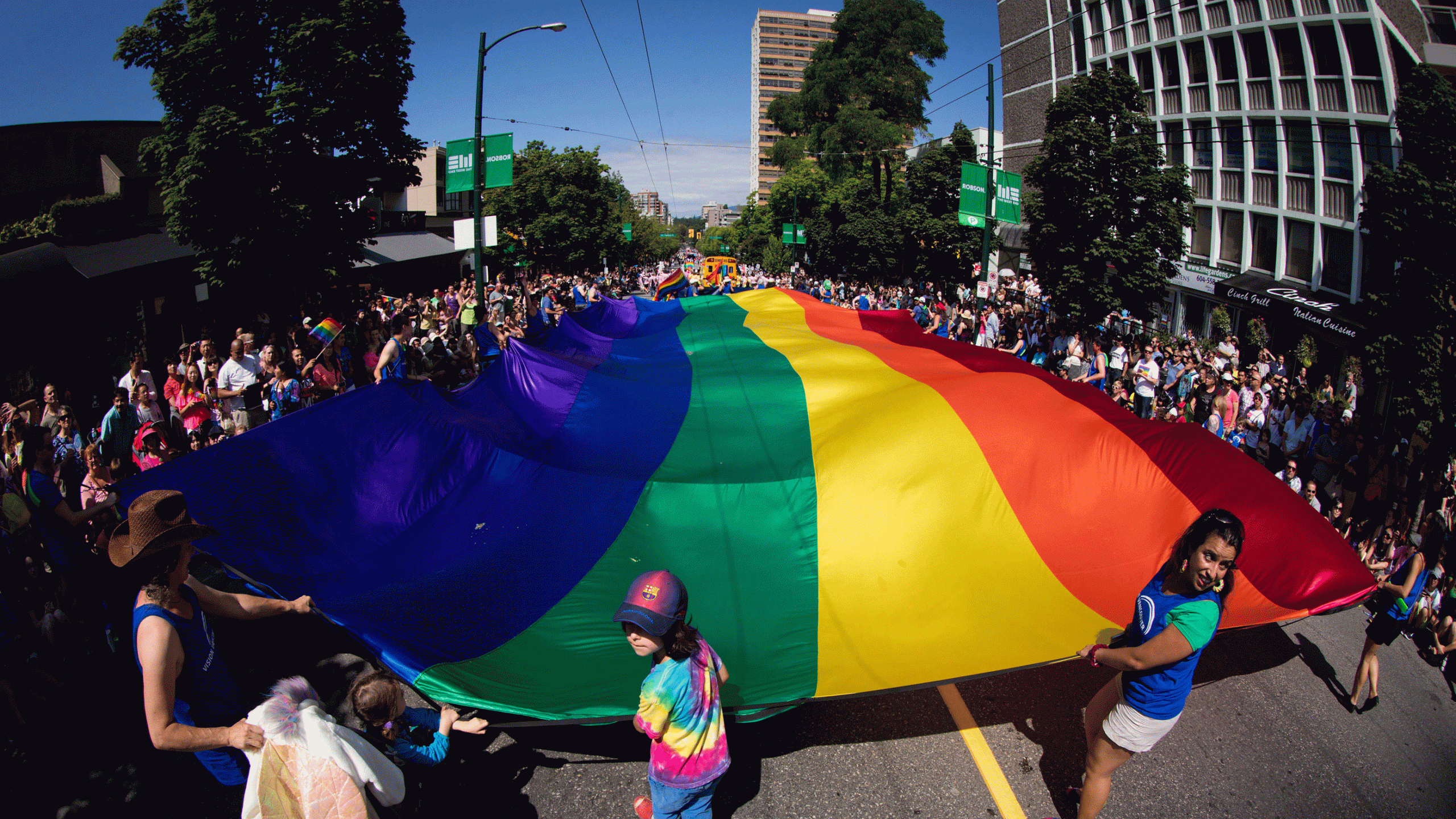 Two Canadian Olympians march in Pride Parade