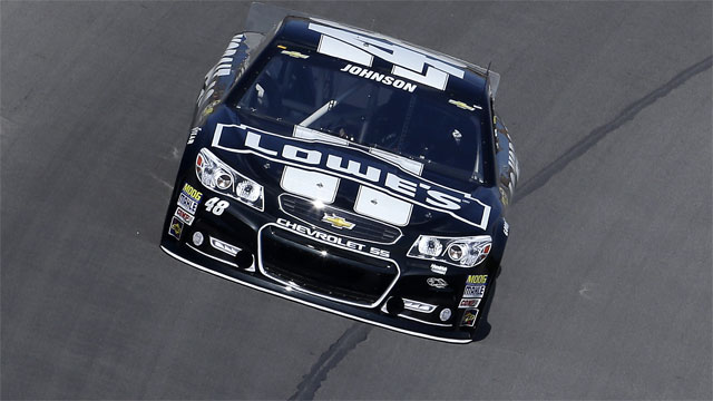 Five-time champ Johnson crashes in Michigan