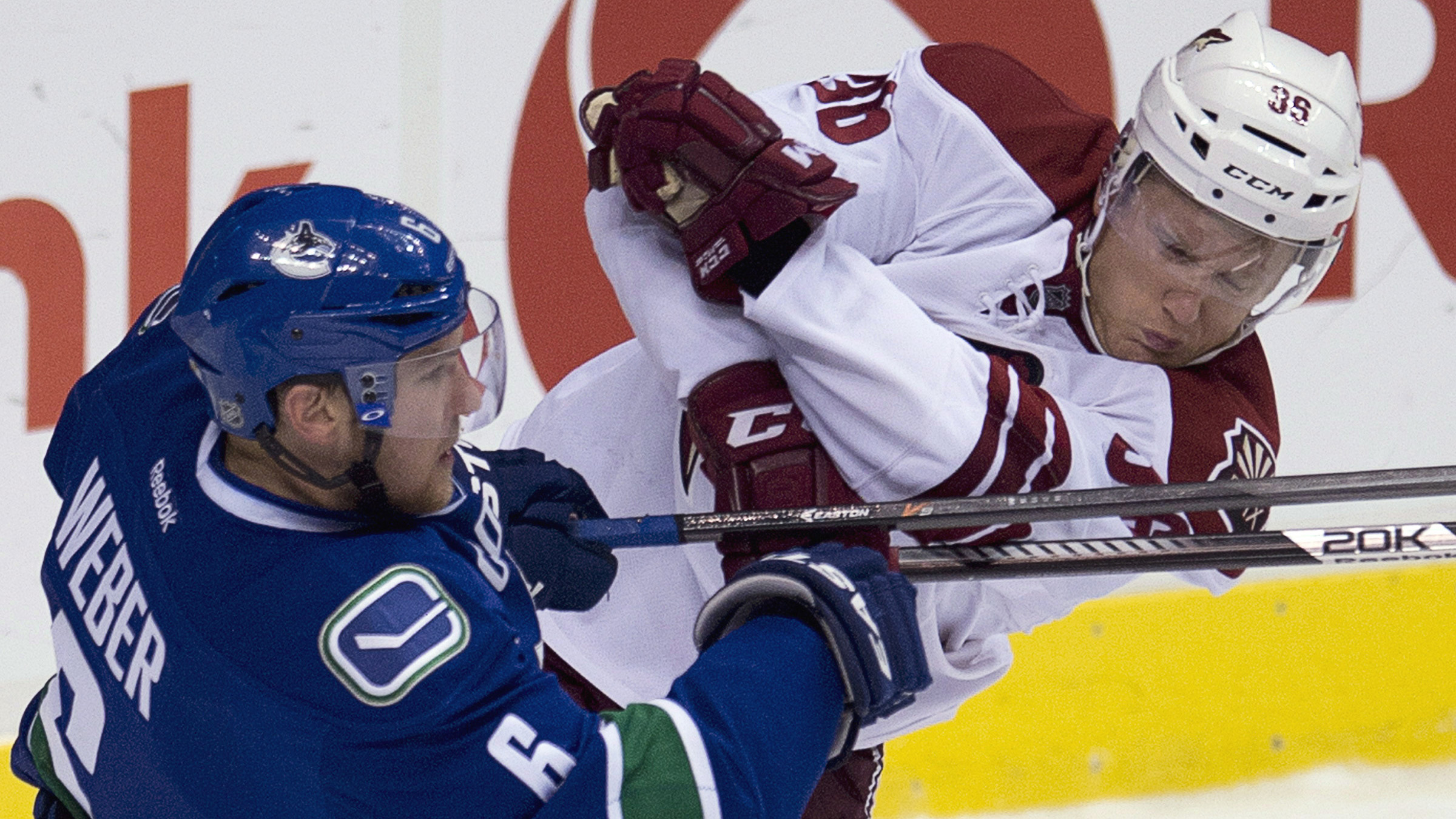 Canucks officially re-sign Kassian, Weber