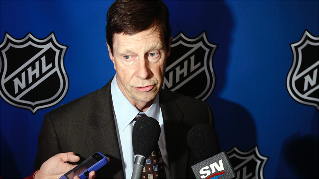 Predators GM Poile hospitalized by puck to face
