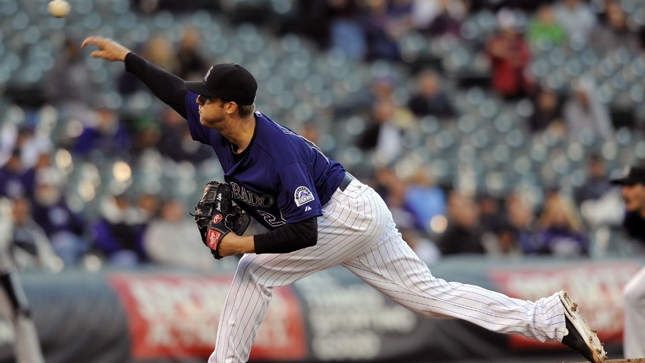 Lyles dazzles with arm, bat in Rockies win
