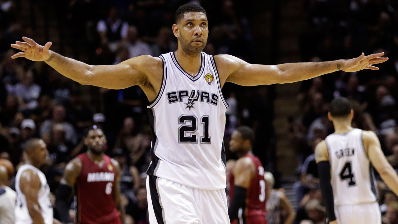 James cramps up as Spurs overcome Heat