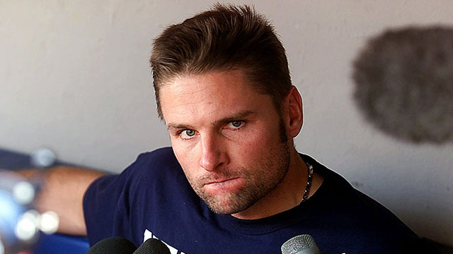 Ex-MLBer Knoblauch charged with assault