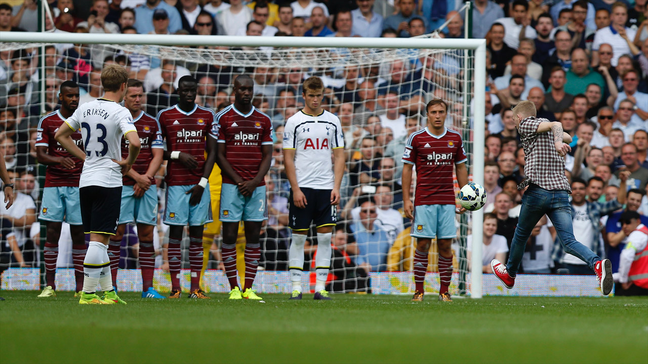 Watch: Pitch invader takes free kick for Spurs