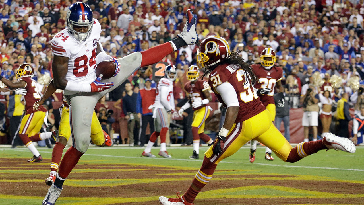 Donnell catches three TDs; Giants rout Redskins
