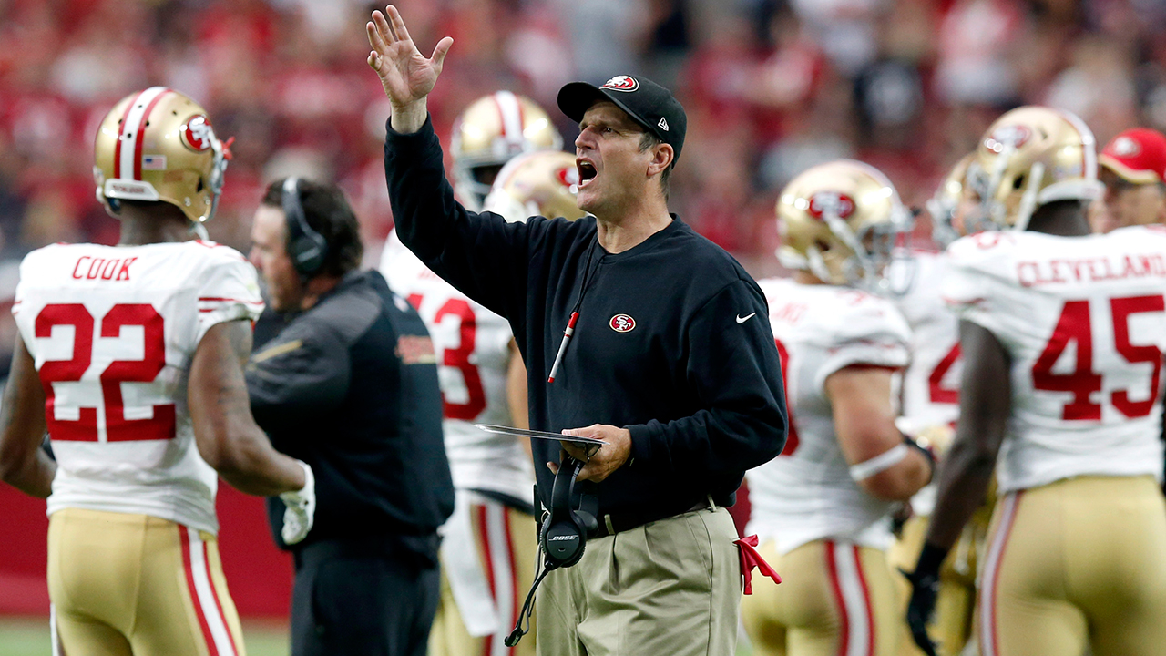 49ers’ Harbaugh takes charge, unfazed by scrutiny