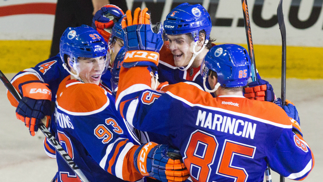 Oilers edge Lightning to earn first win of season