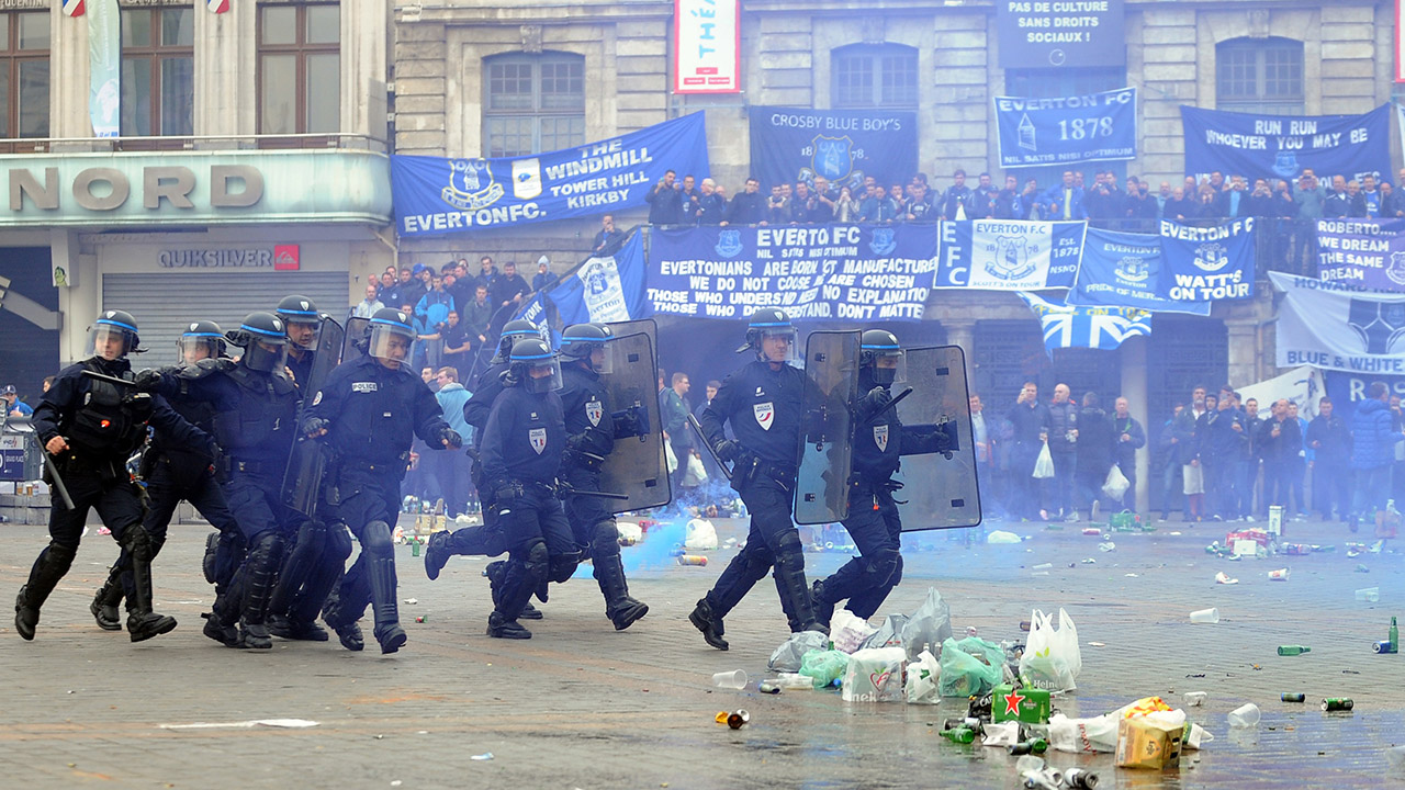 French riot police use tear gas on Everton fans