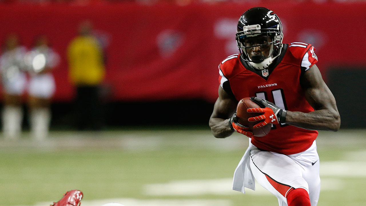 Jones has career day, Falcons upset Cardinals