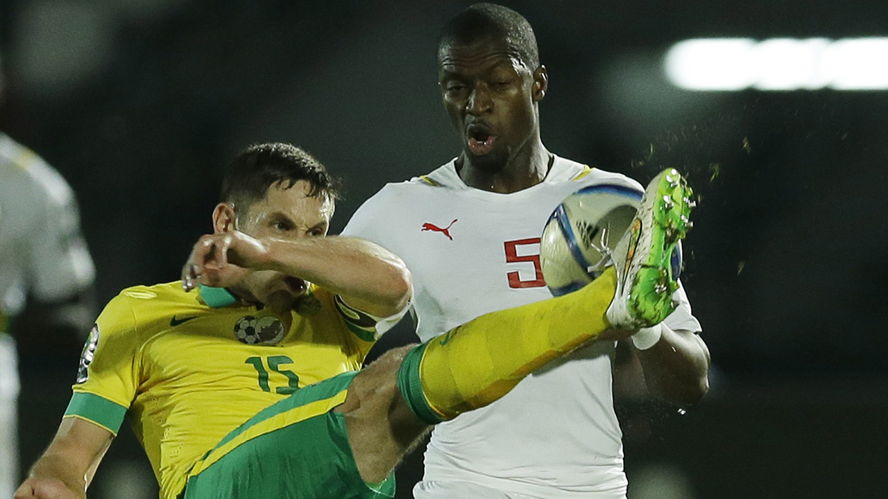 Senegal tops group at African Cup after 1-1 draw