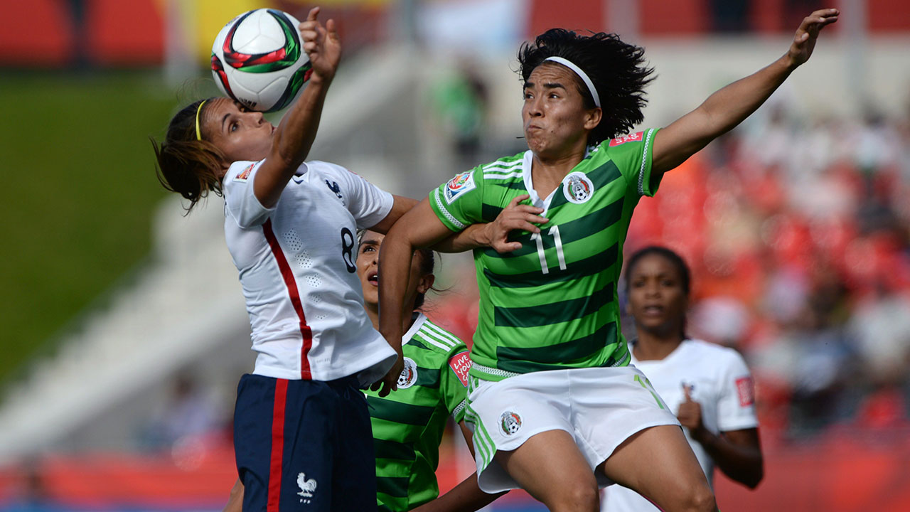 France claims top spot in Group F with huge win