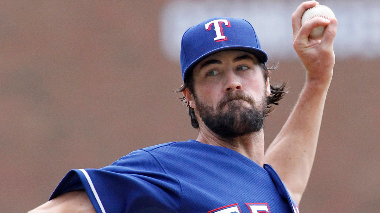 Hamels, Rangers beat Tigers to hold onto wild-card spot