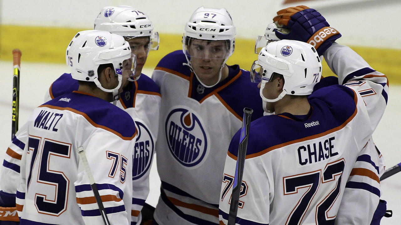 McDavid has goal and assist in professional debut