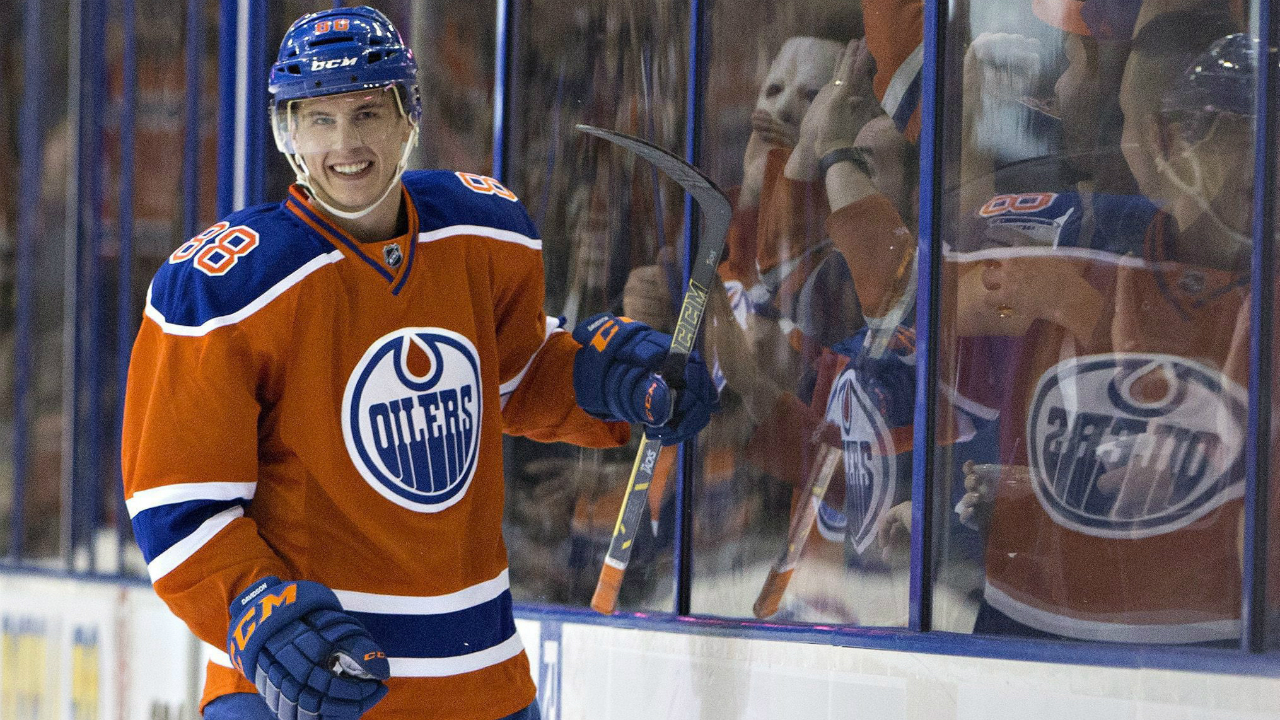 Oilers’ Brandon Davidson leaves game after colliding with Byfuglien