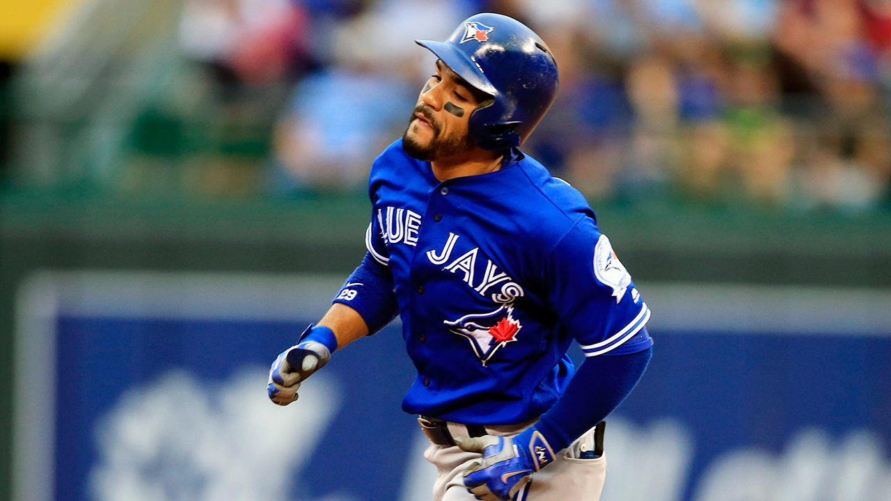 Travis goes deep twice as Blue Jays win opener vs. Royals