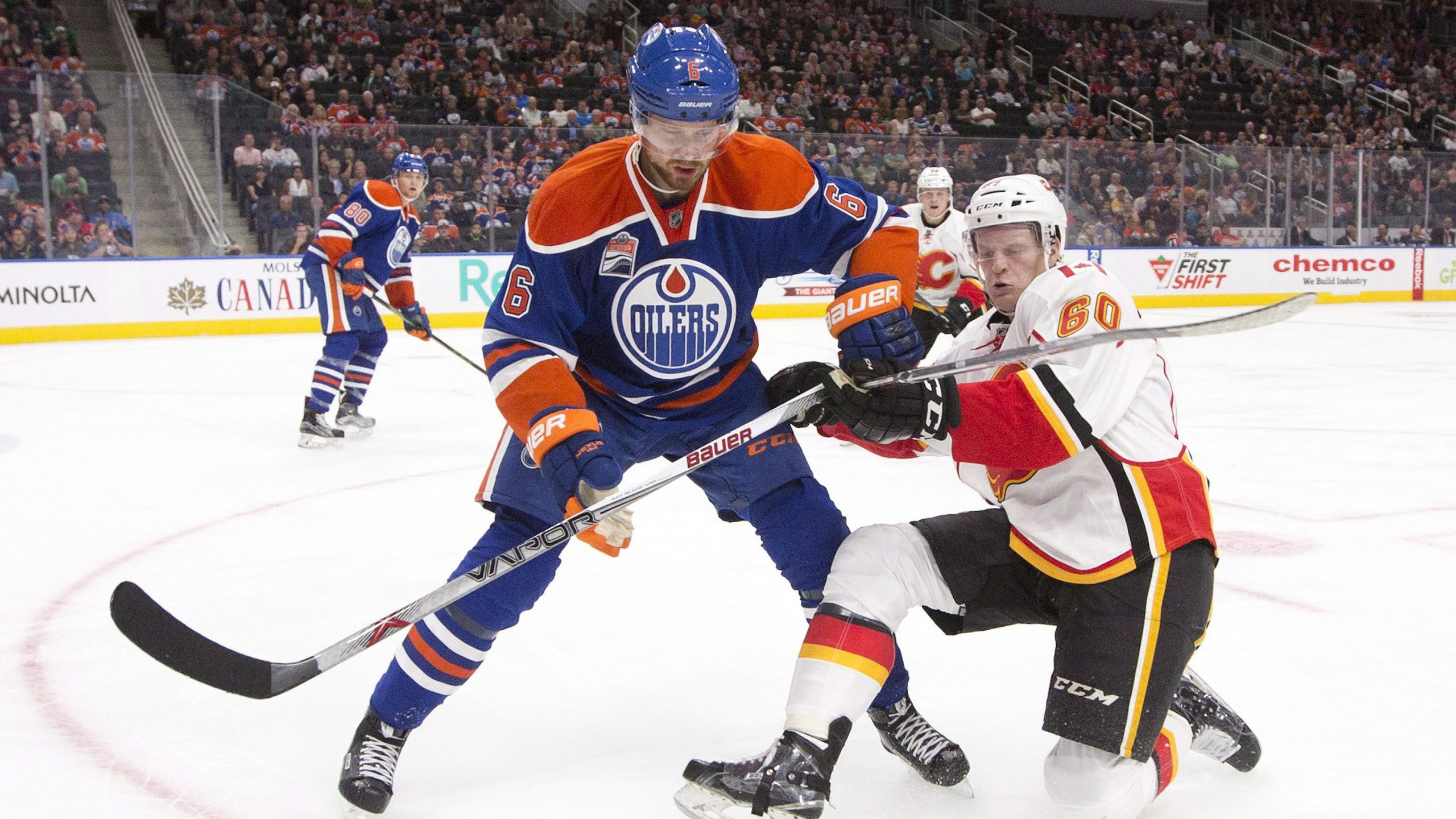 Oilers beat Flames to win pre-season debut at new arena