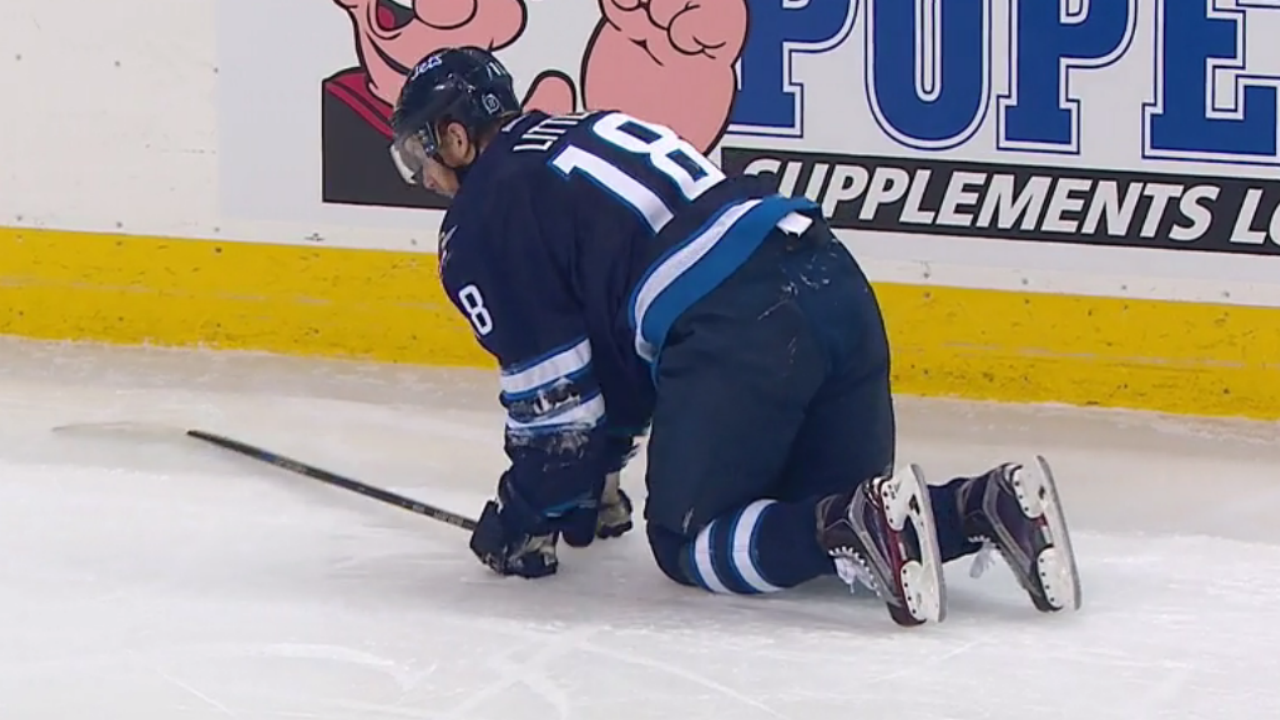 Jets’ Bryan Little leaves game with lower-body injury
