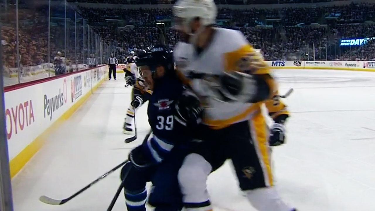 Jets’ Toby Enstrom hospitalized after hit from behind