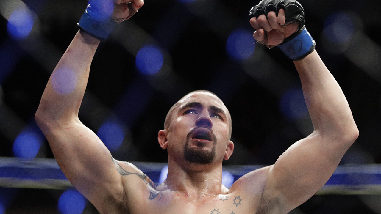 Robert Whittaker edges Romero, grabs interim belt at UFC 213