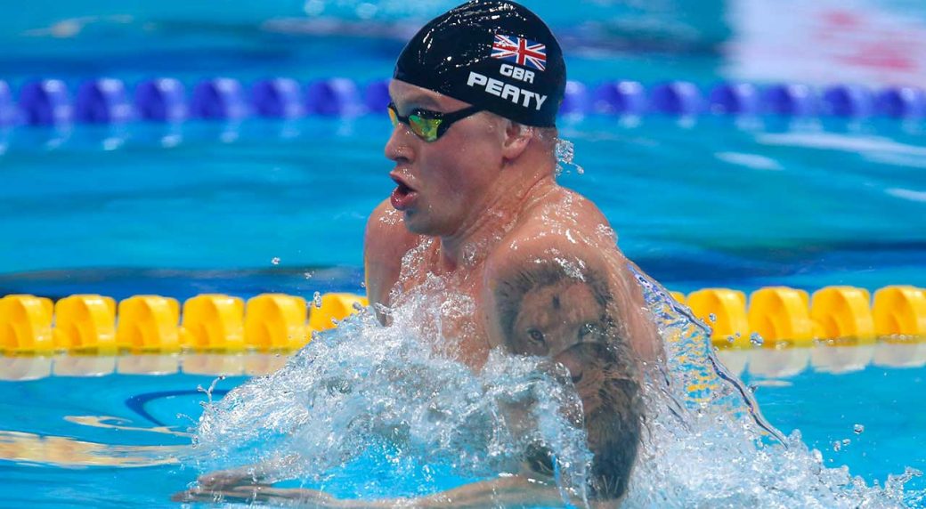 Adam Peaty breaks world record in men's 50m breaststroke at worlds ...