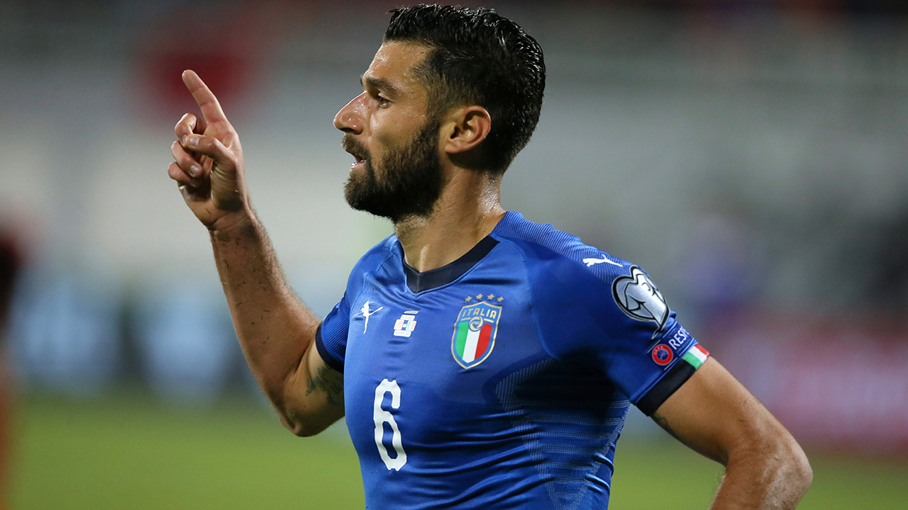 Italy scrapes past Albania to secure top seed status in playoff