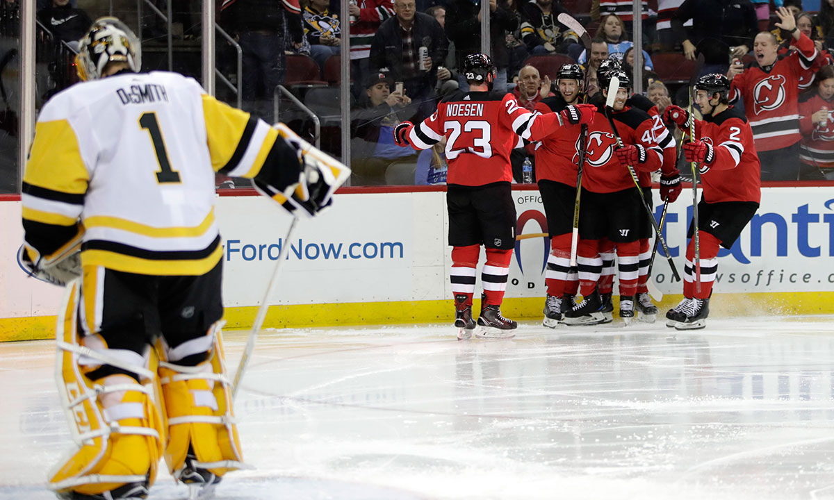 Travis Zajac scores twice to lead Devils past Penguins