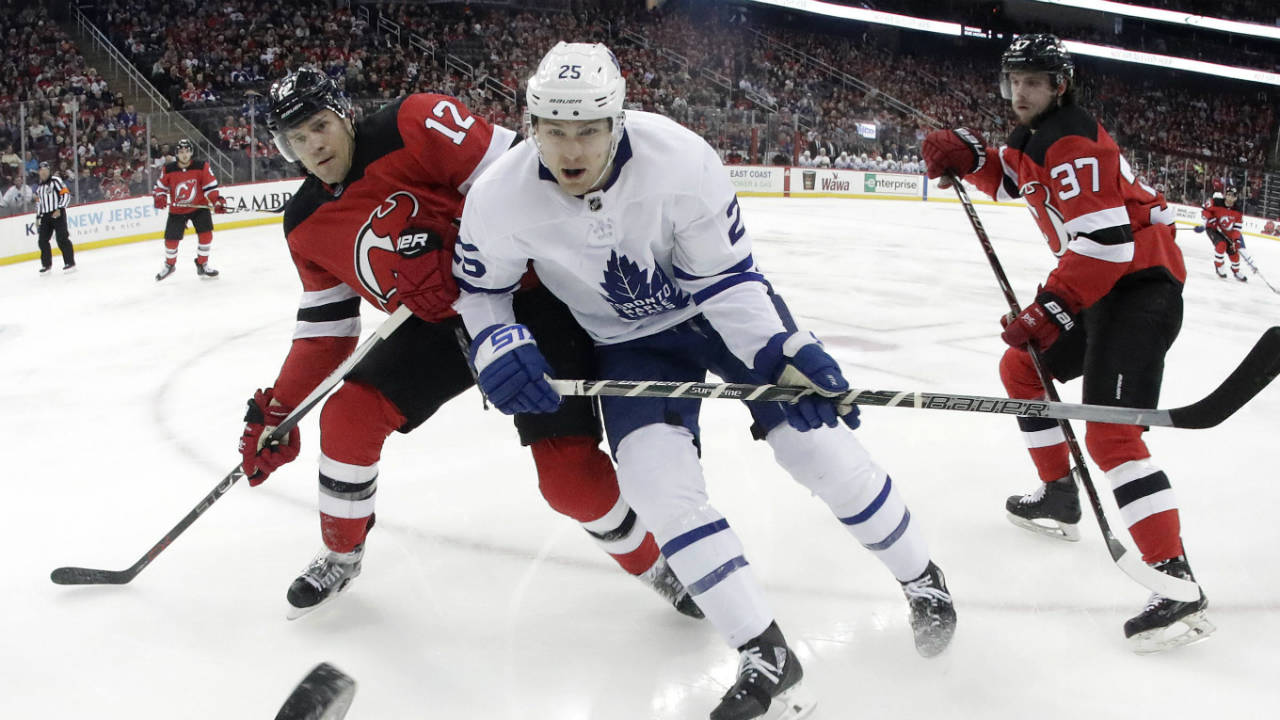Devils make playoffs with win over Leafs