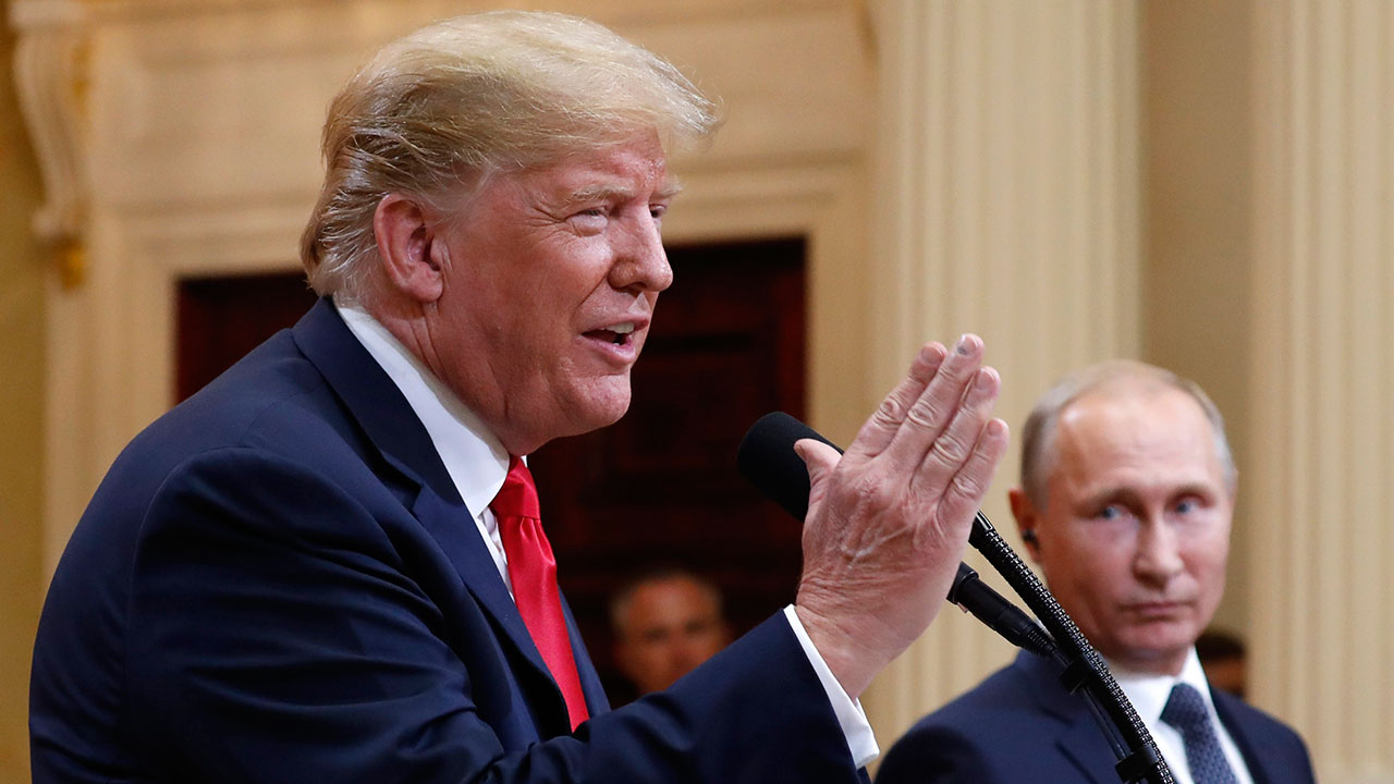 World Cup host Putin gives soccer ball to Trump