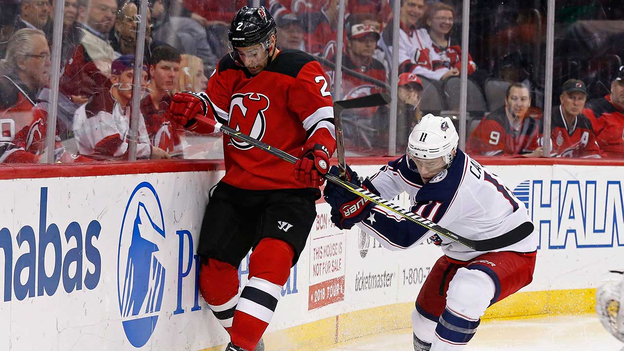 Bruins sign defenceman John Moore to five-year contract