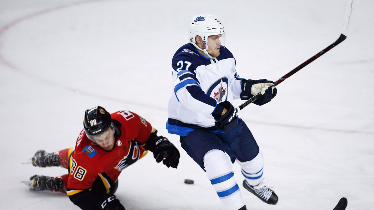Ehlers scores twice as Jets beat Flames in OT