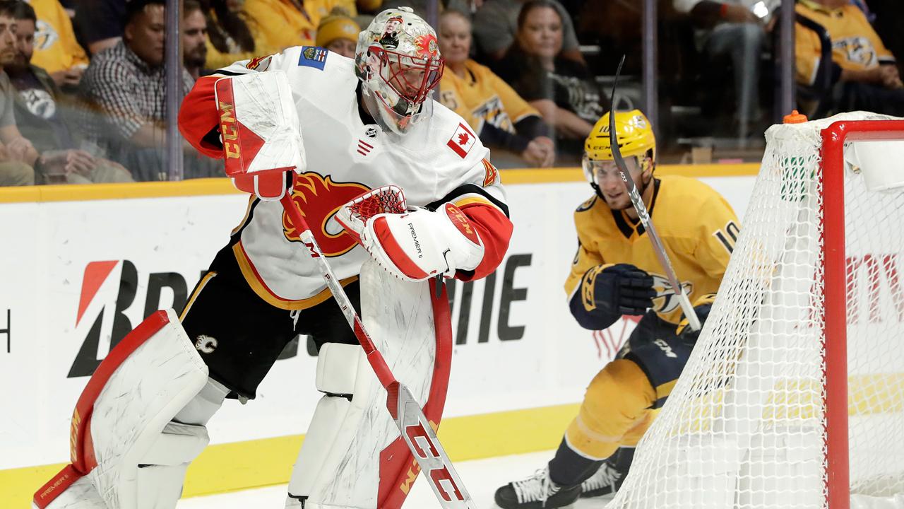 Smith, Flames come up big in heavy test against Predators