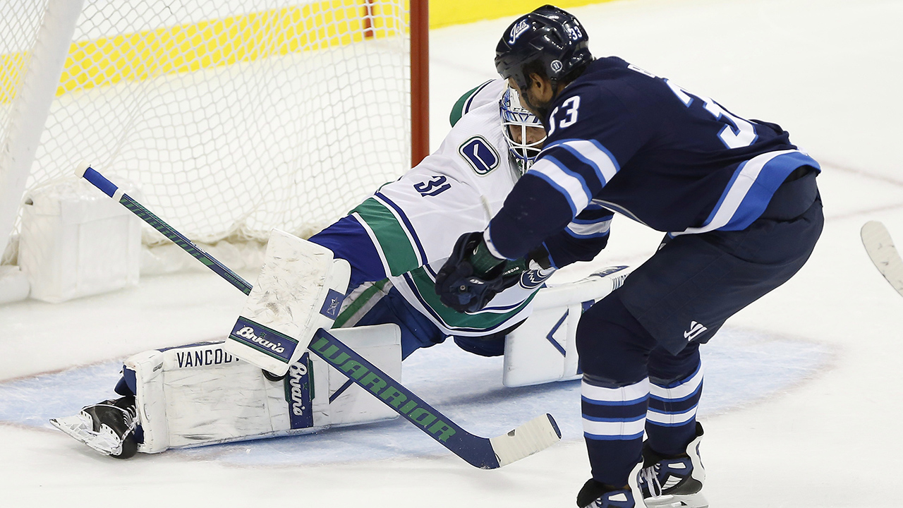 Patrik Laine and Bryan Little lift Jets over Canucks