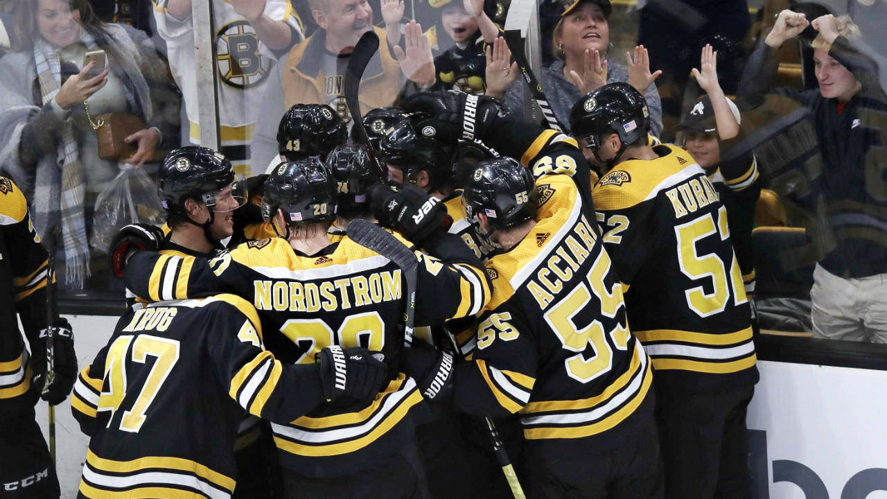 Marchand scores in OT to lift Bruins over Stars