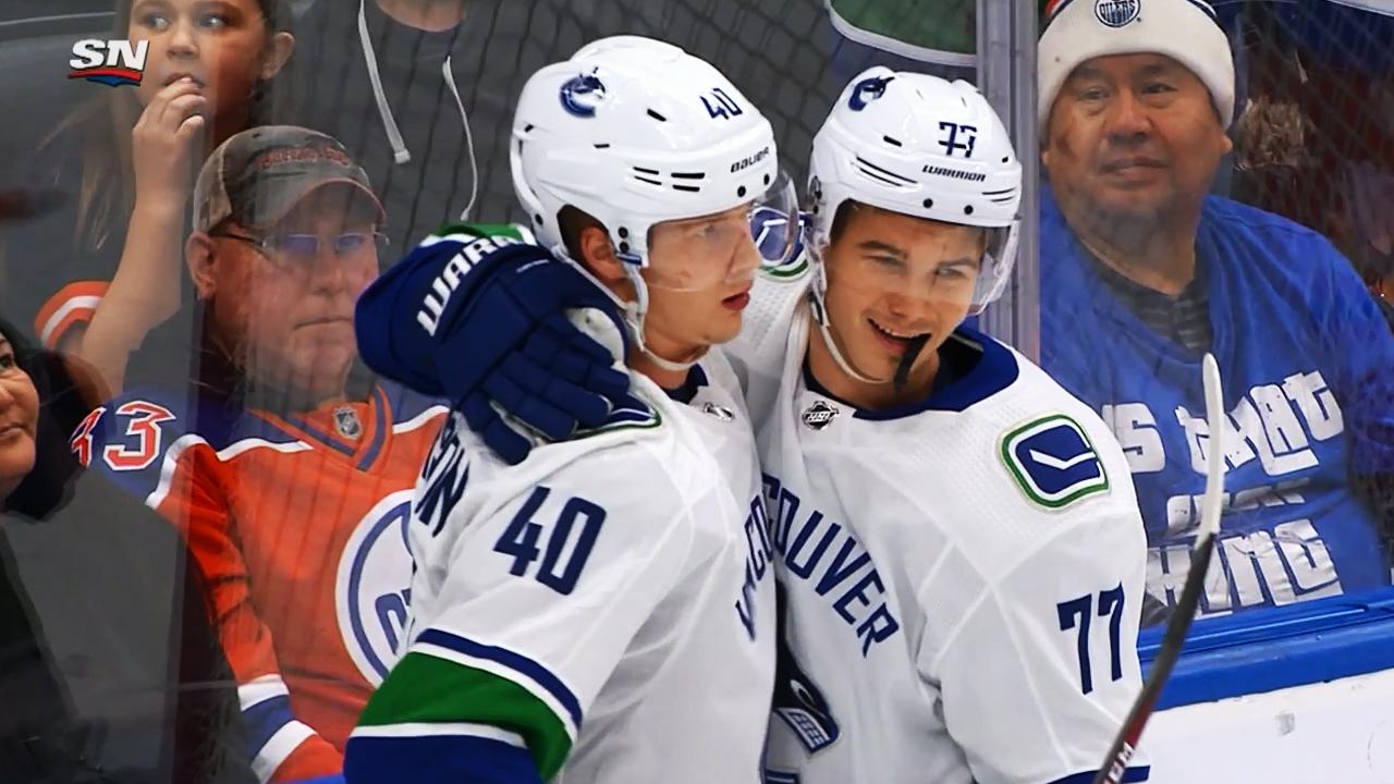 Canucks score four goals on first six shots, cruise past Oilers