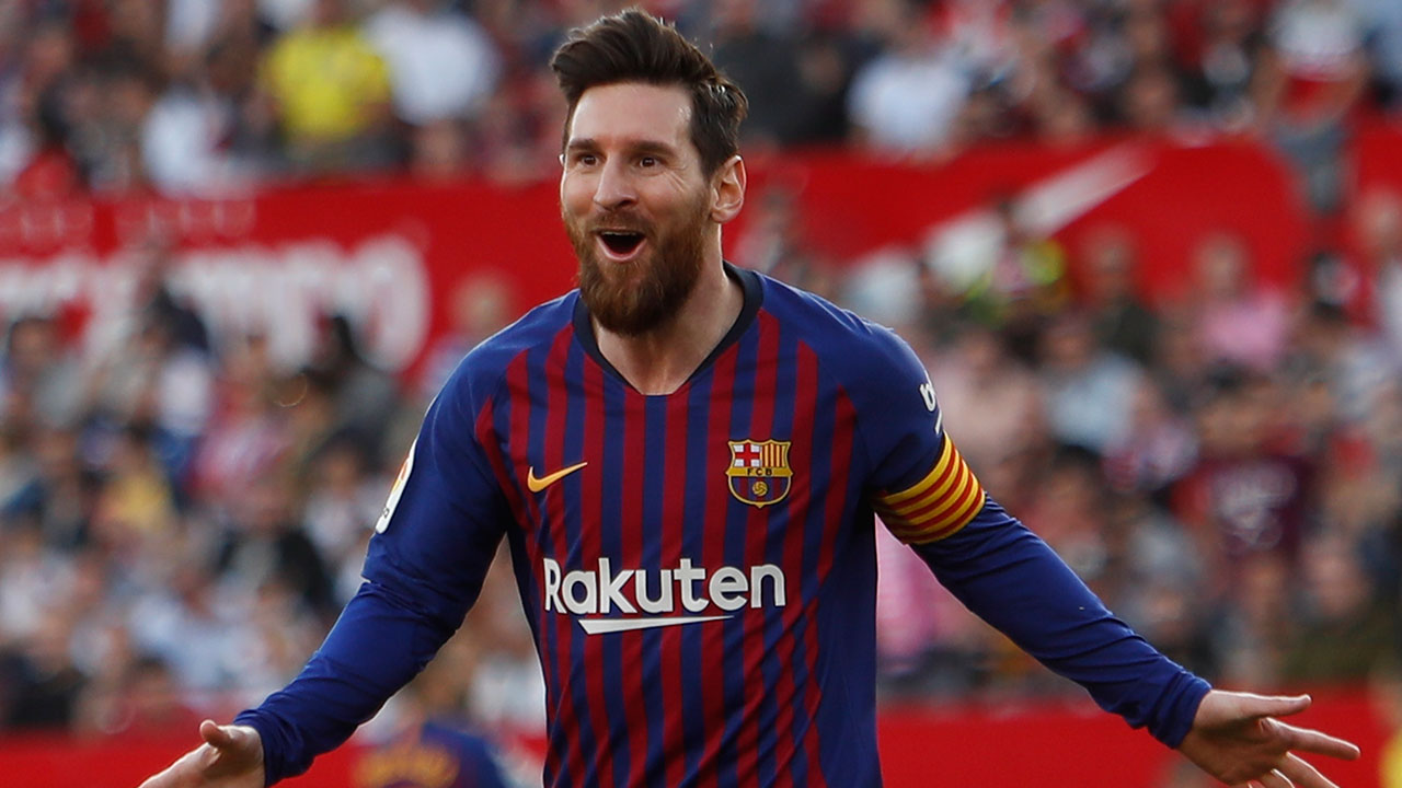 Messi scores hat trick to earn Barcelona victory at Sevilla
