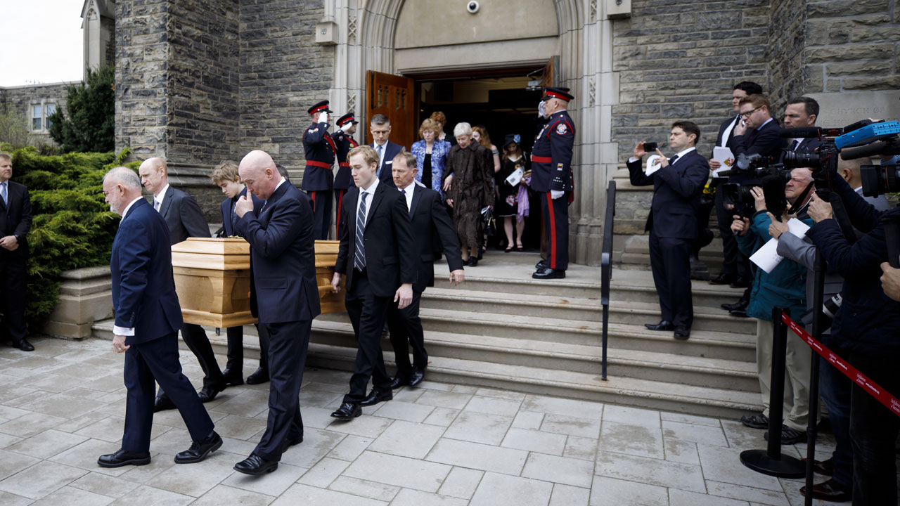 ‘We all looked up to him’: mourners reflect on Red Kelly at funeral