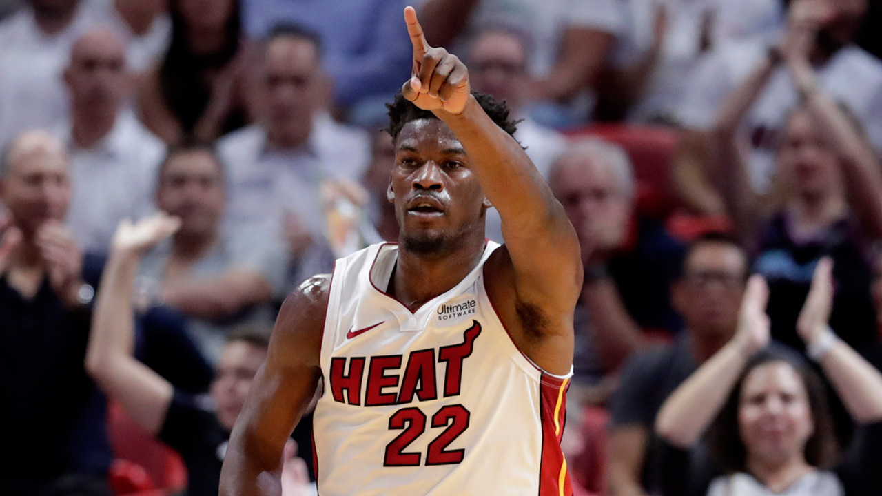 Butler has 21 points to lead Heat past Hawks in season debut