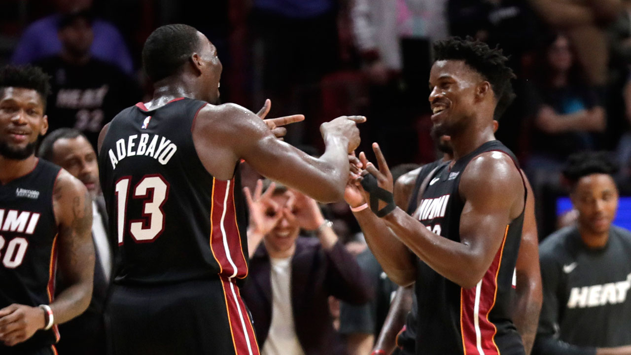 Heat use 22-0 late run, two triple-doubles to top Hawks in OT
