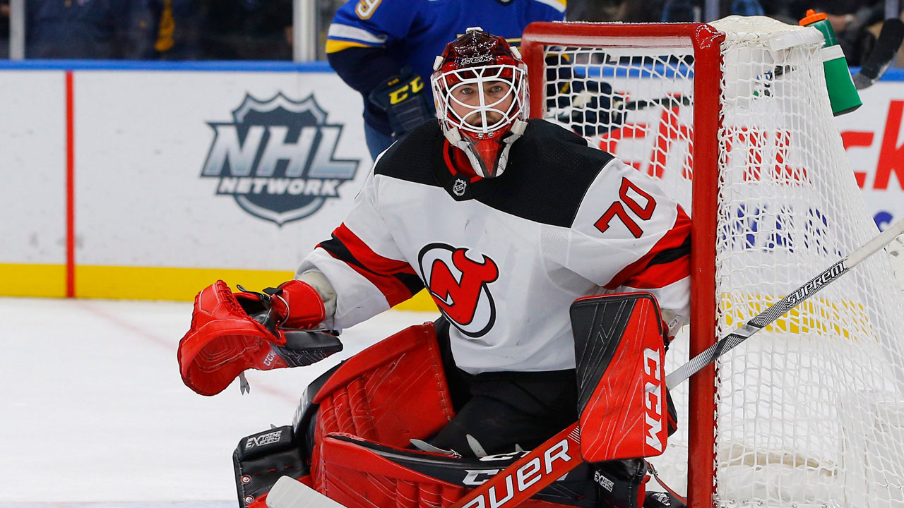 Canucks acquire goalie Louis Domingue from Devils for Zane McIntyre