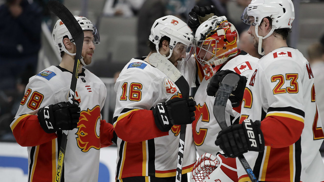 Flames use fast start, highlight-reel Tkachuk goal to beat Sharks